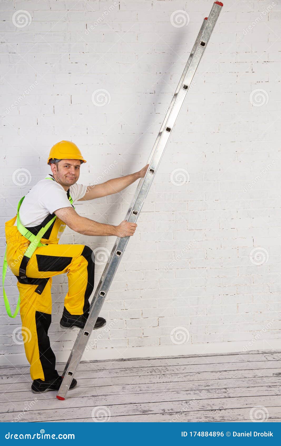 Irresponsible Use of a Ladder during Construction Work. Stock Photo ...