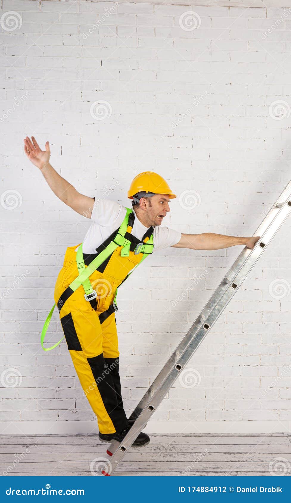 Irresponsible Use of a Ladder during Construction Work. Stock Photo ...