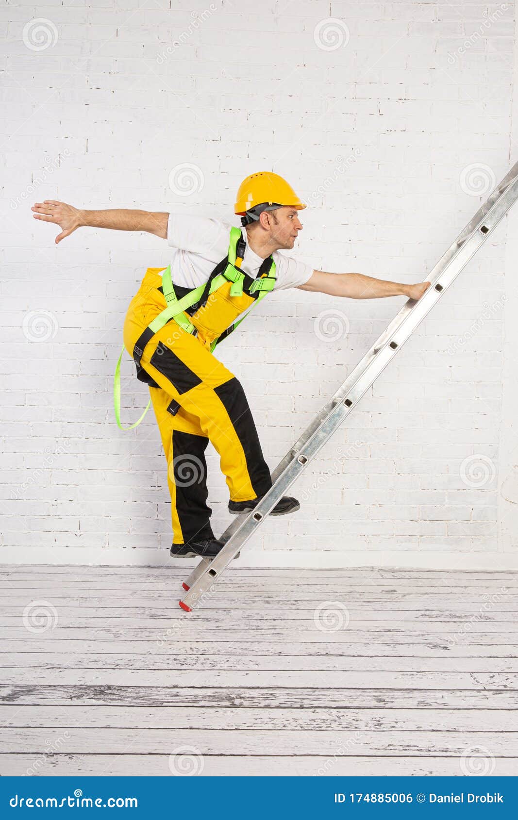 Irresponsible Use of a Ladder during Construction Work. Stock Photo ...