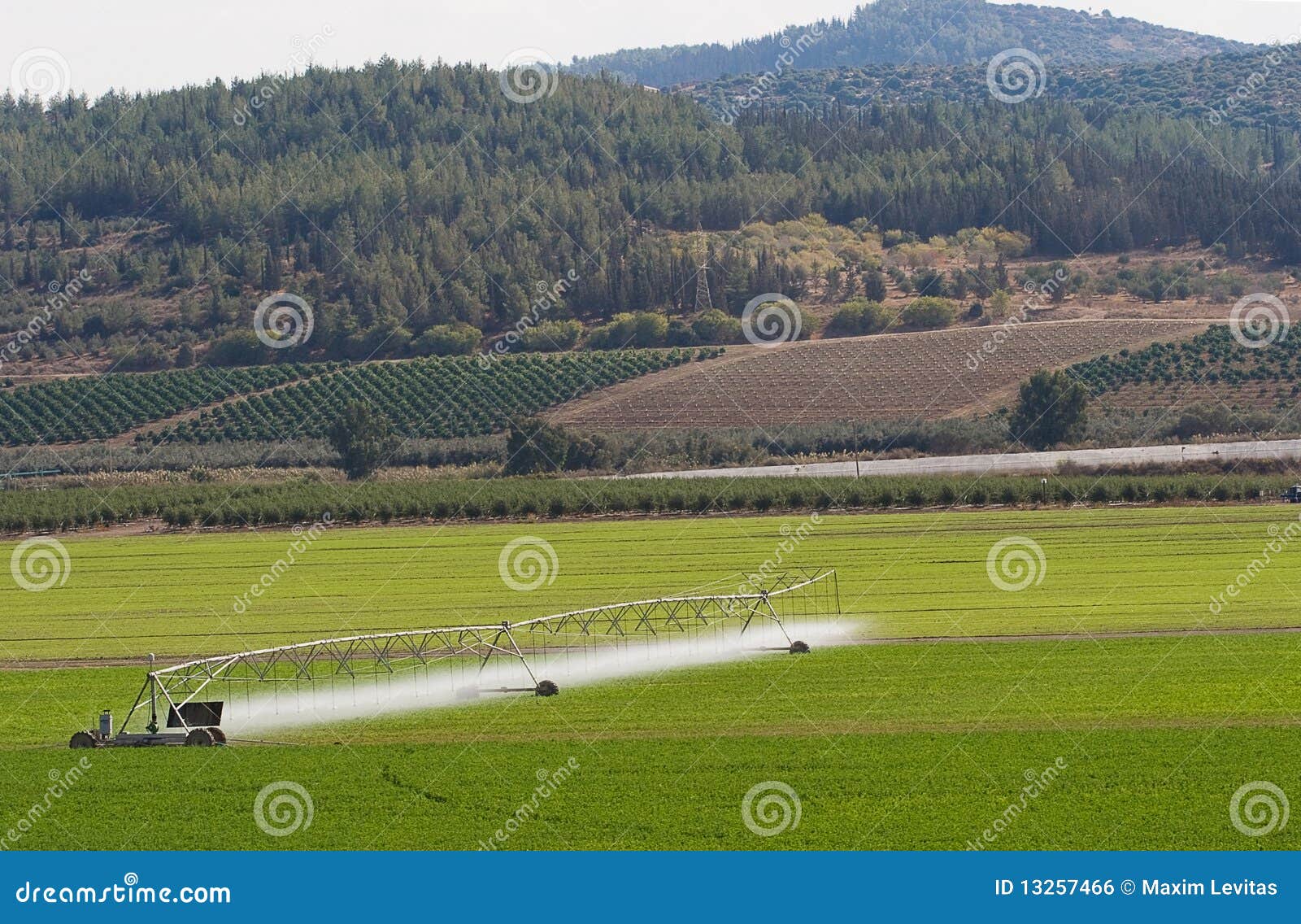 Irrigating machine stock photo. Image of village, machine - 13257466