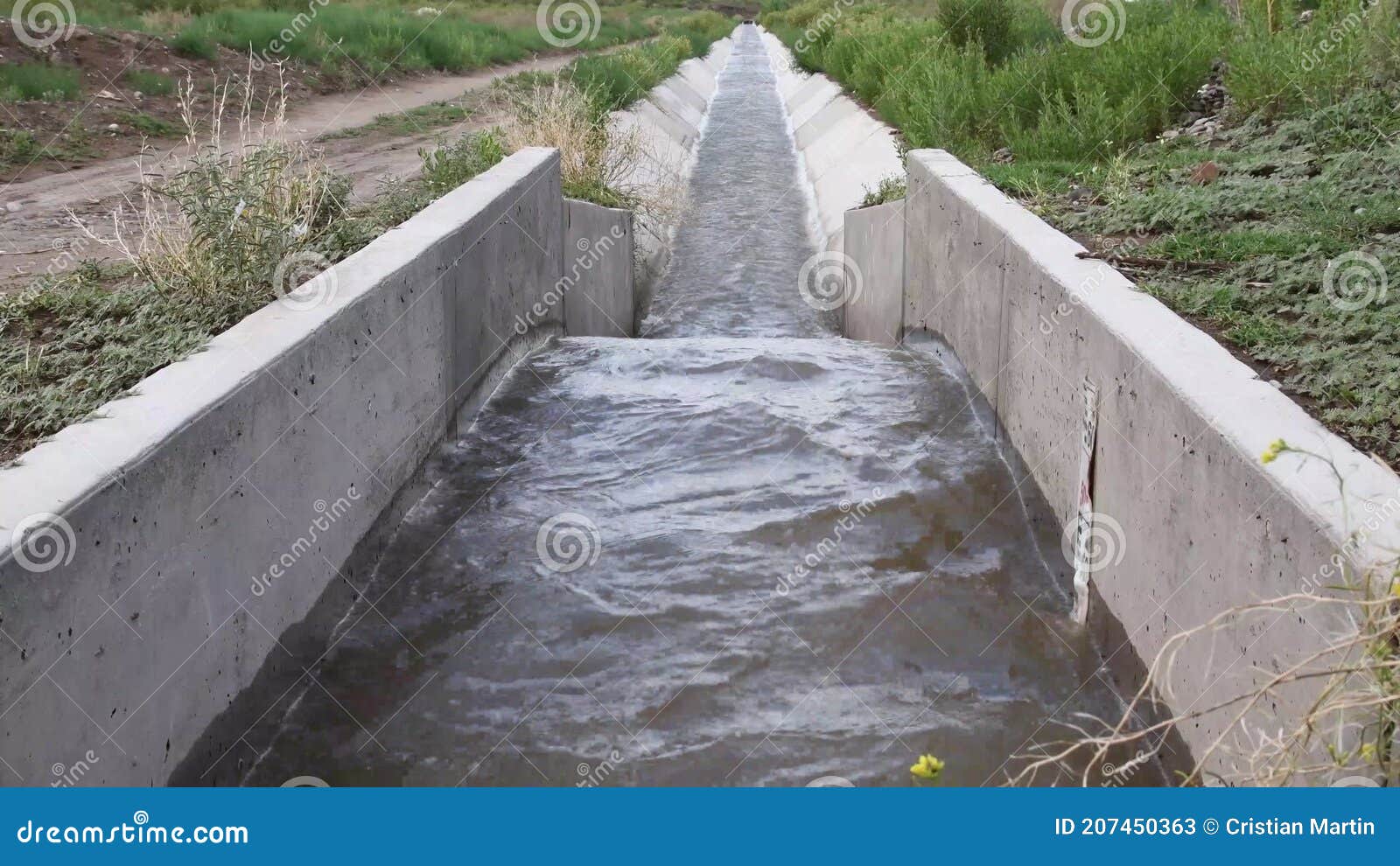 Irrigation Ditch with a Flow Measurement Structure Stock Video - Video ...