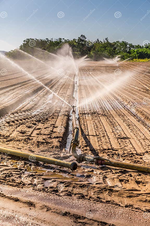 Irrigation System on a Large Farm Field Stock Photo - Image of ...