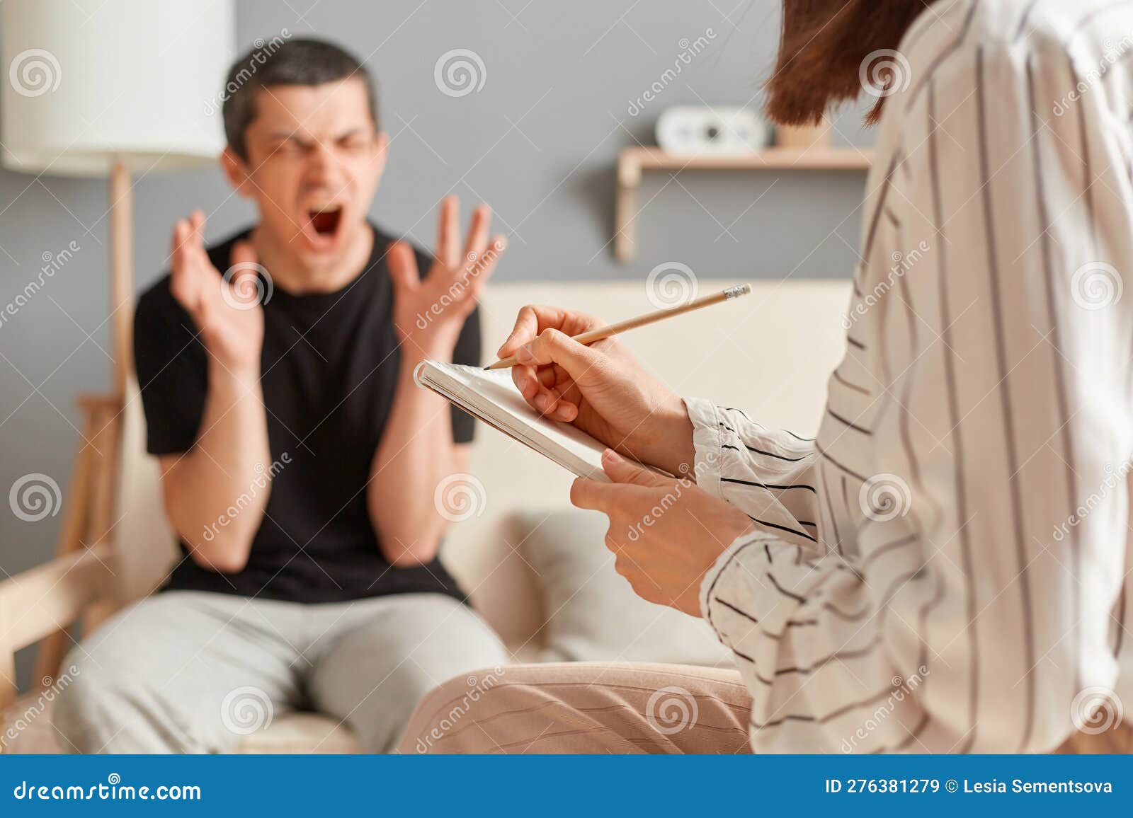 Irritated Annoyed Man Sitting on Sofa at Therapy Session Suffering Mind ...