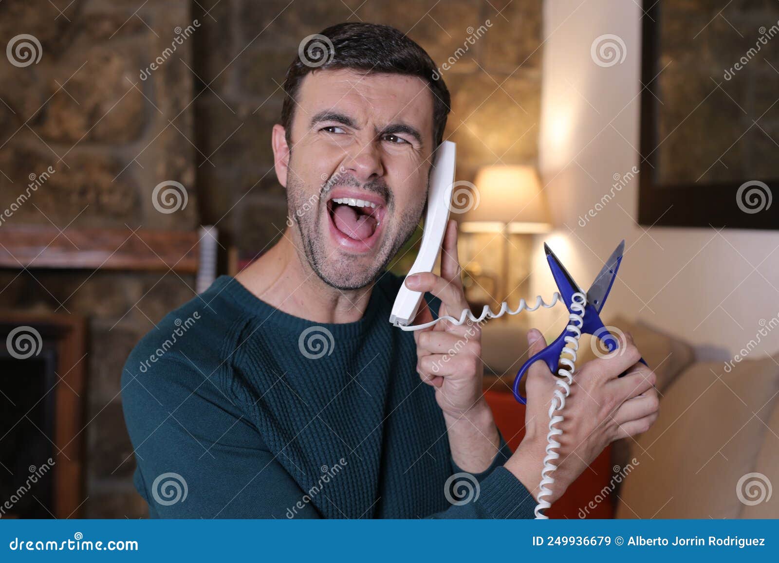 Irritated Man Cutting Telephone Cord with Scissors Stock Image - Image ...