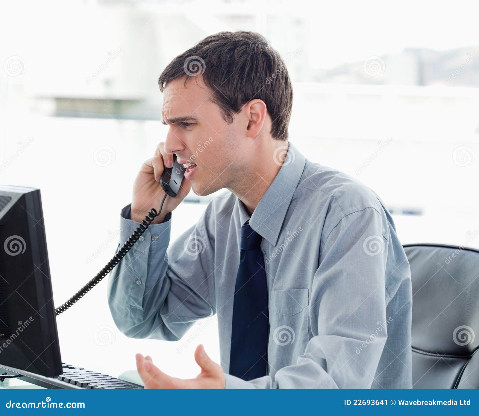 Irritated Office Worker on the Phone Stock Image - Image of phone ...
