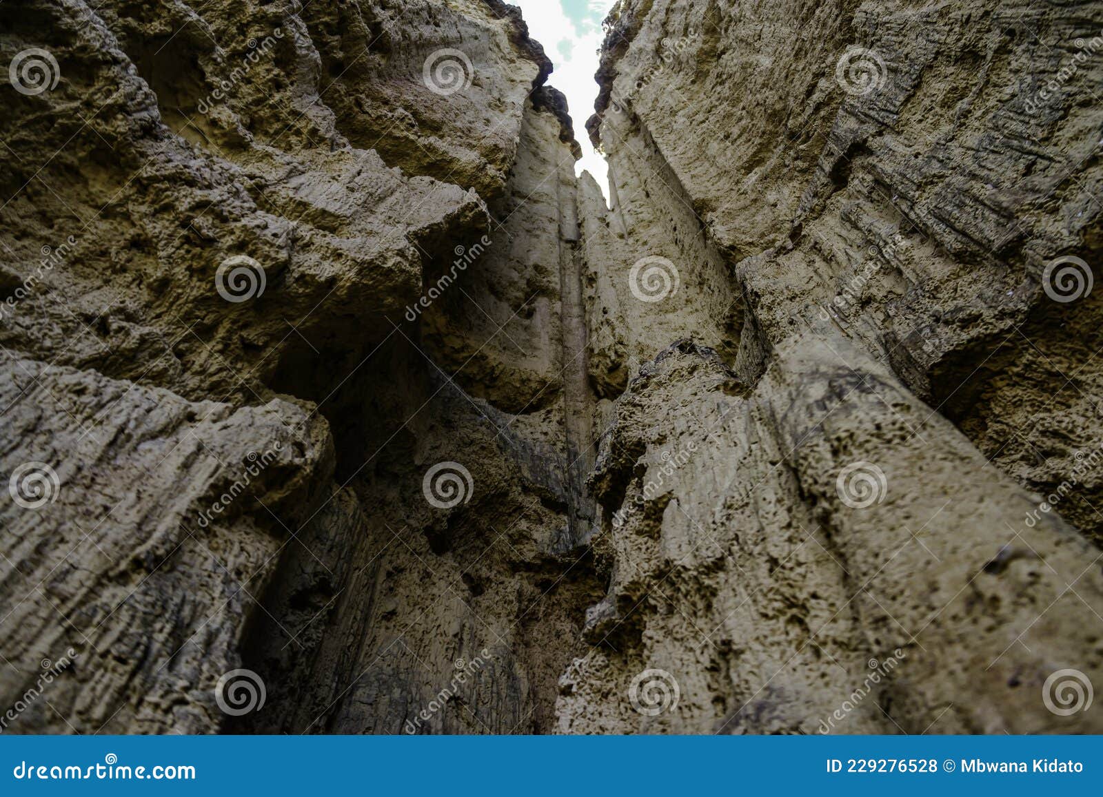 Isimila Sand Pillars Under Bly Sky Stock Photo - Image of formed ...