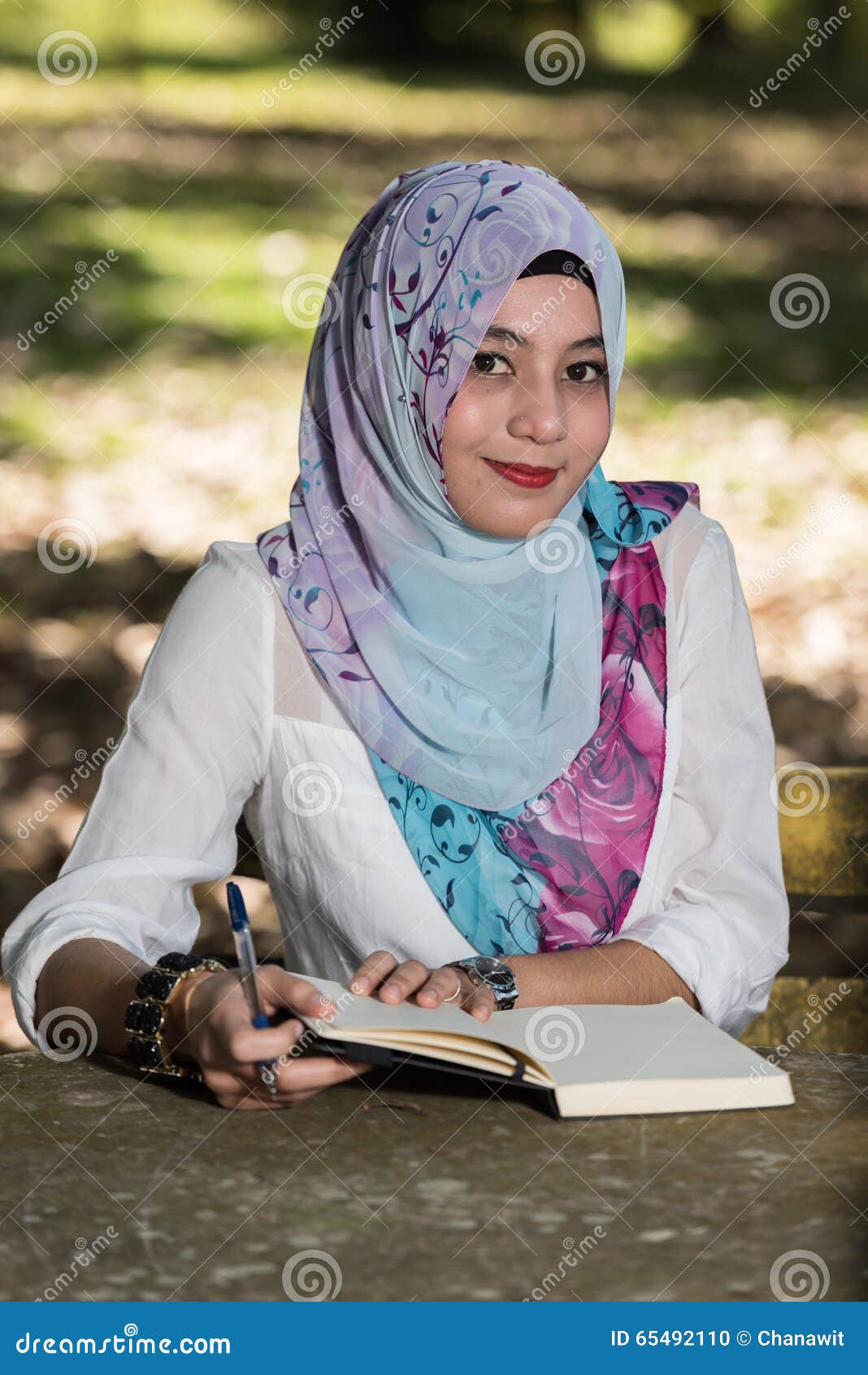 Islam woman write diary stock photo. Image of summer - 65492110