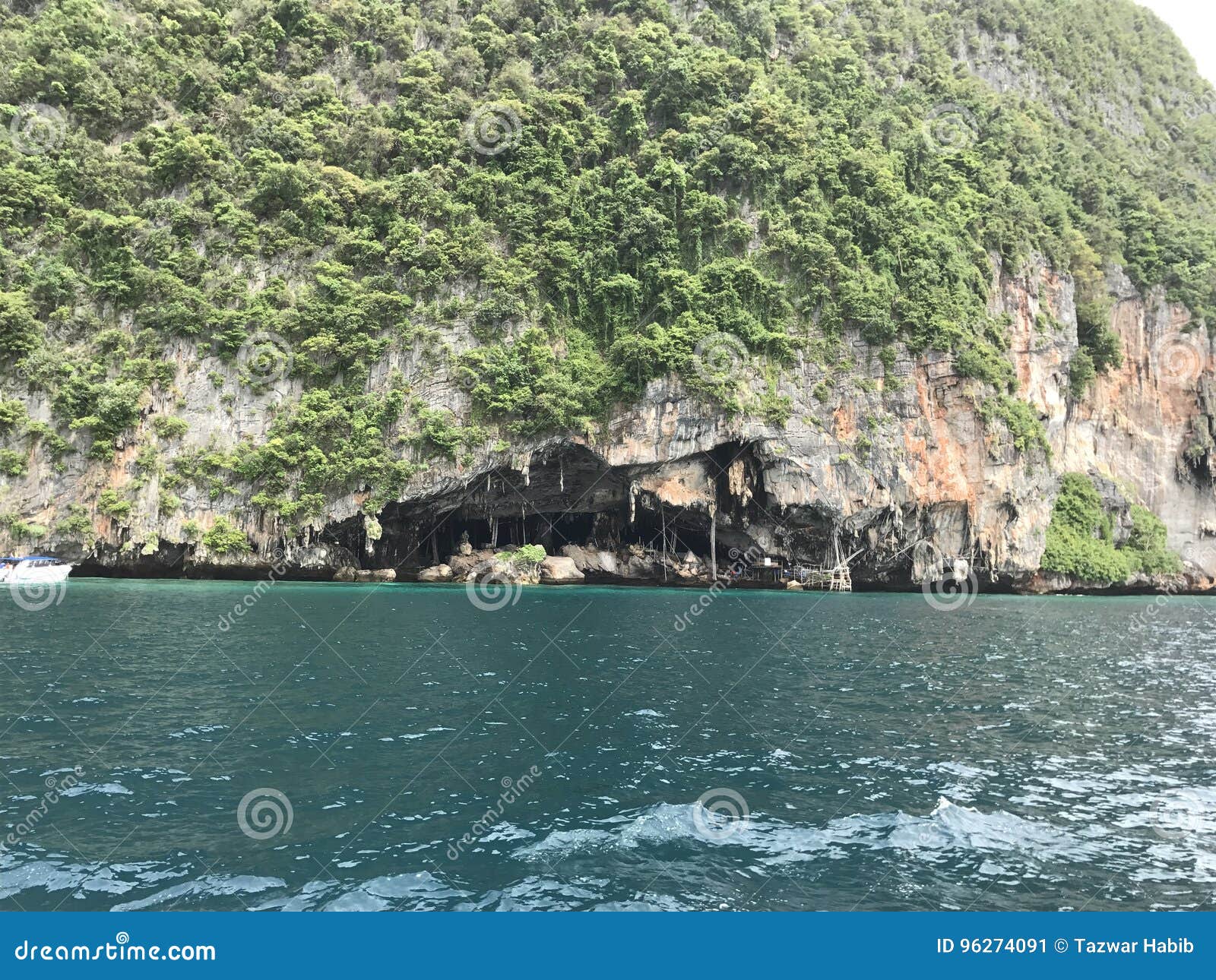 Island with Cave stock image. Image of cave, bluesea - 96274091