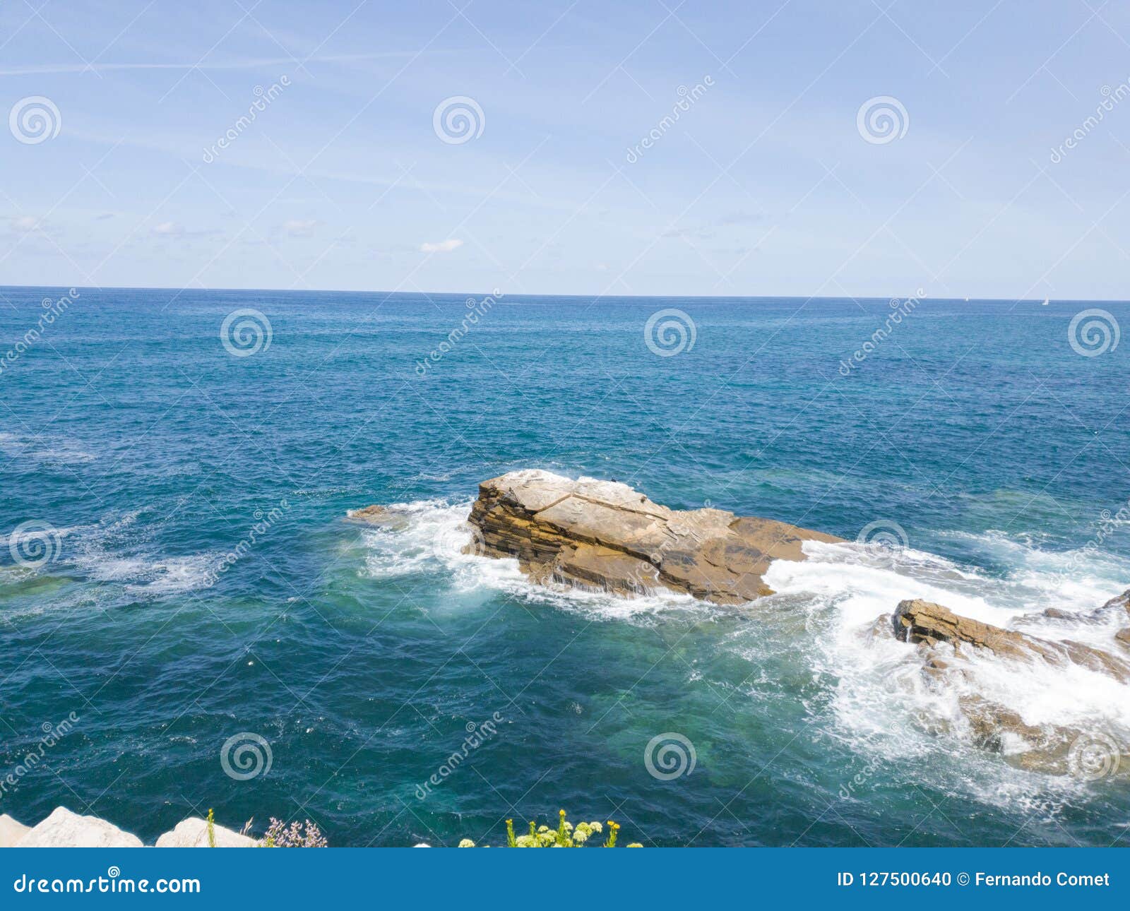 Islets of Rocks Over the Blue Sea on a Sunny Day Stock Photo - Image of ...