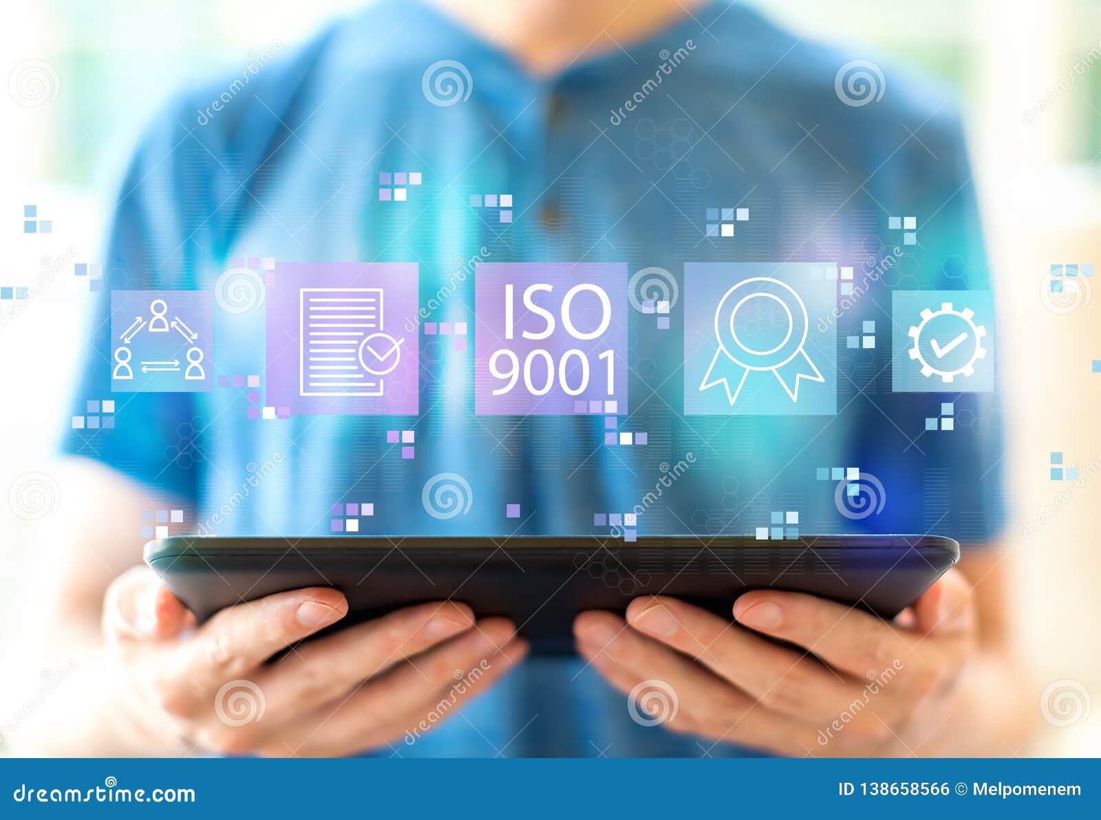 ISO 9001 with Man Using a Tablet Stock Photo - Image of house ...