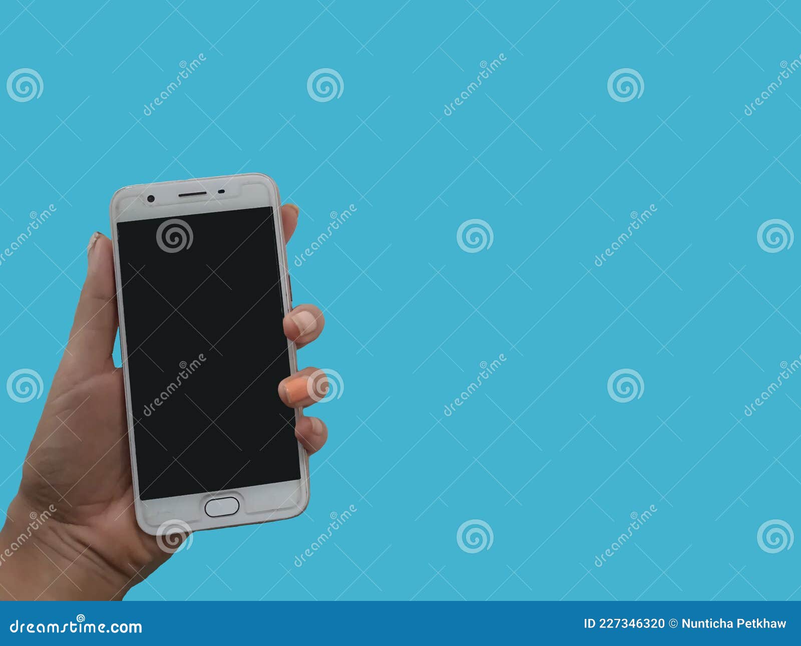 Isolate of Hand Holding Phone on Blue Background Stock Photo - Image of ...