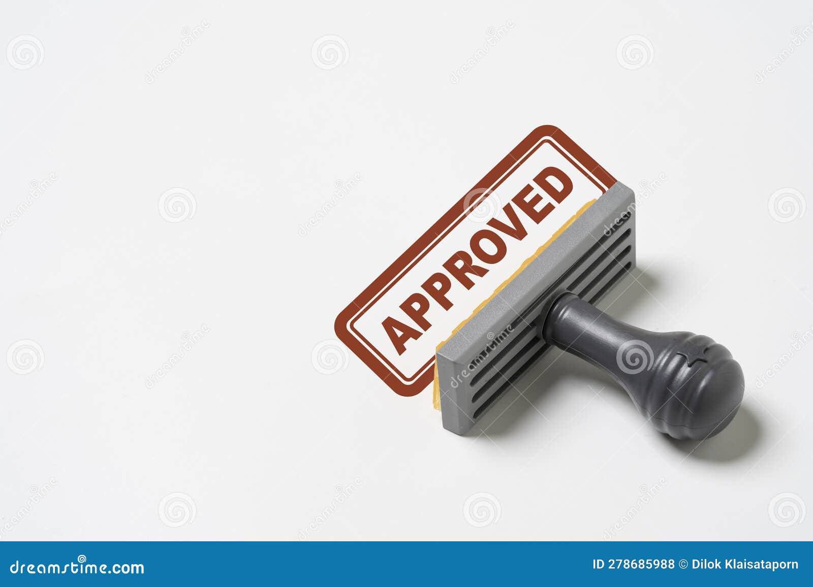 Isolate of Red Text Approved Wording with Rubber Stamper on White ...