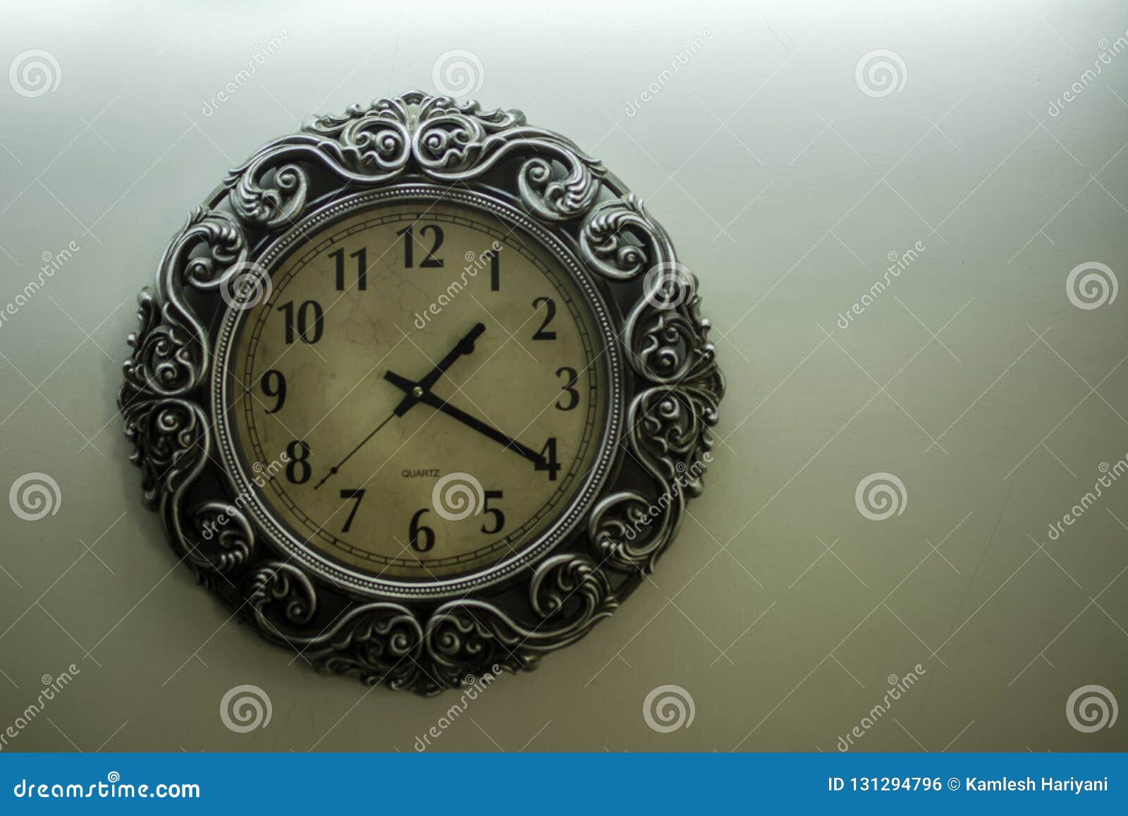 Ancient Designer Wall Clock with Light Yellow Back Ground Showing Time ...