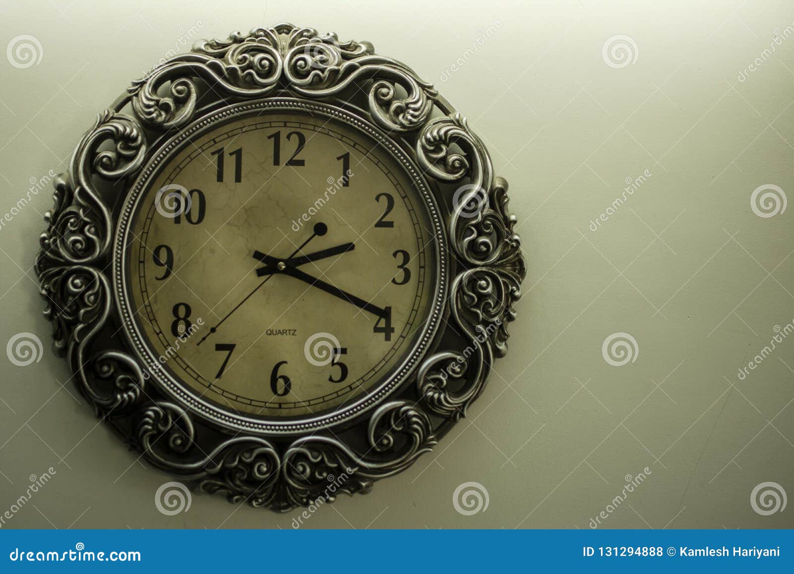 Ancient Designer Wall Clock with Light Yellow Back Ground Showing Time ...