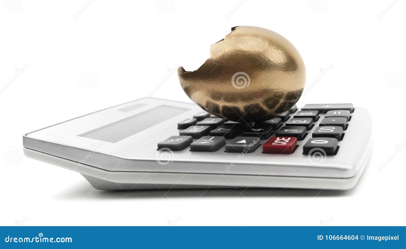 Cracked Golden Egg on a Calculator Stock Photo - Image of calculation ...