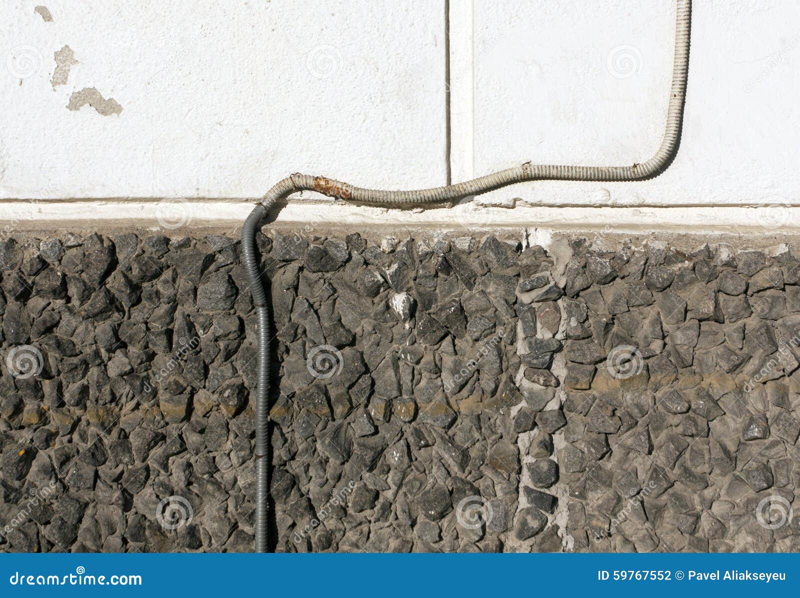 Isolated Electrical Wire on Stone and Plaster Wall. Stock Photo - Image ...