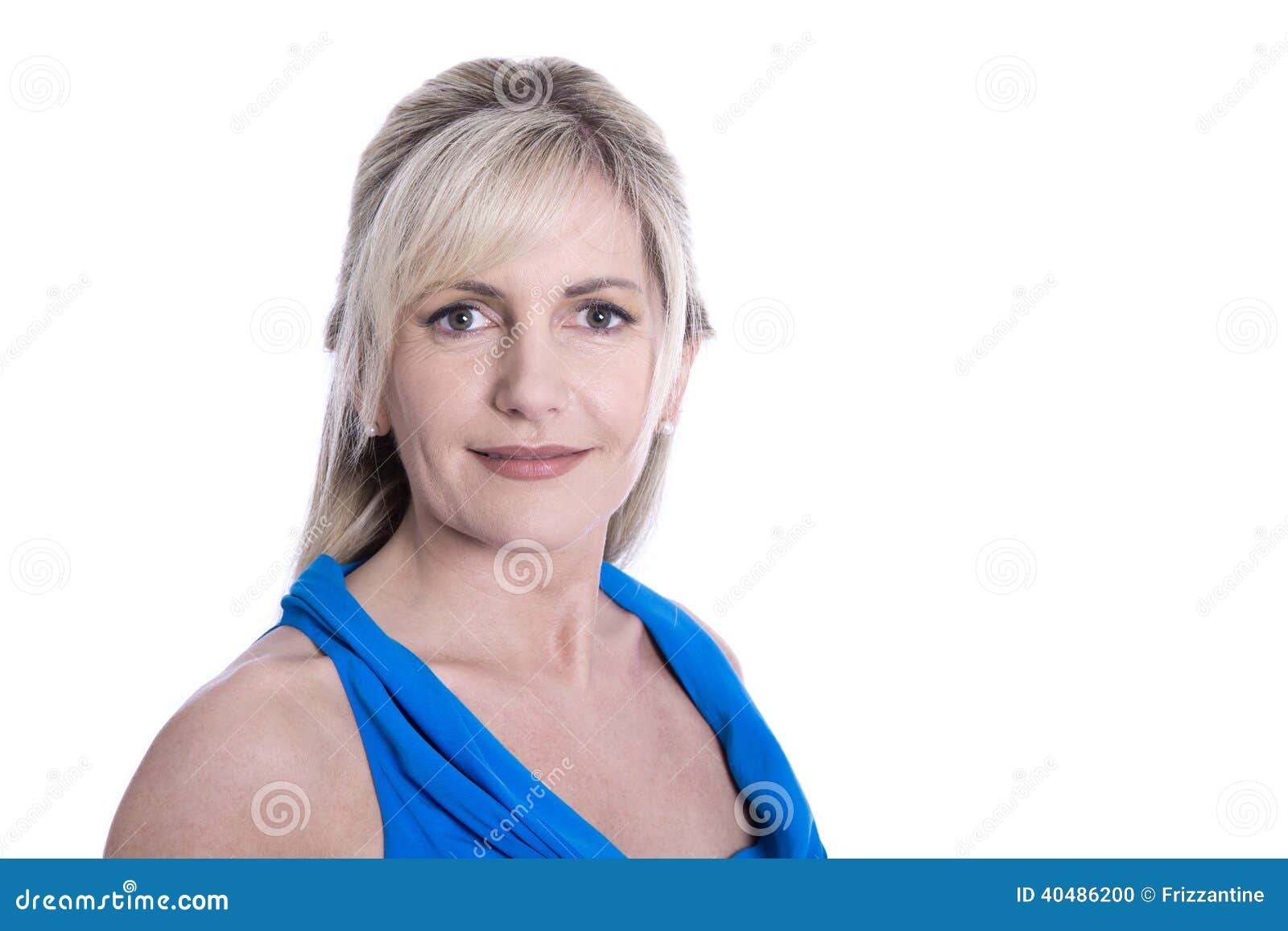 Isolated Face Of A Beautiful Middle Aged Blond Woman In Blue Stock
