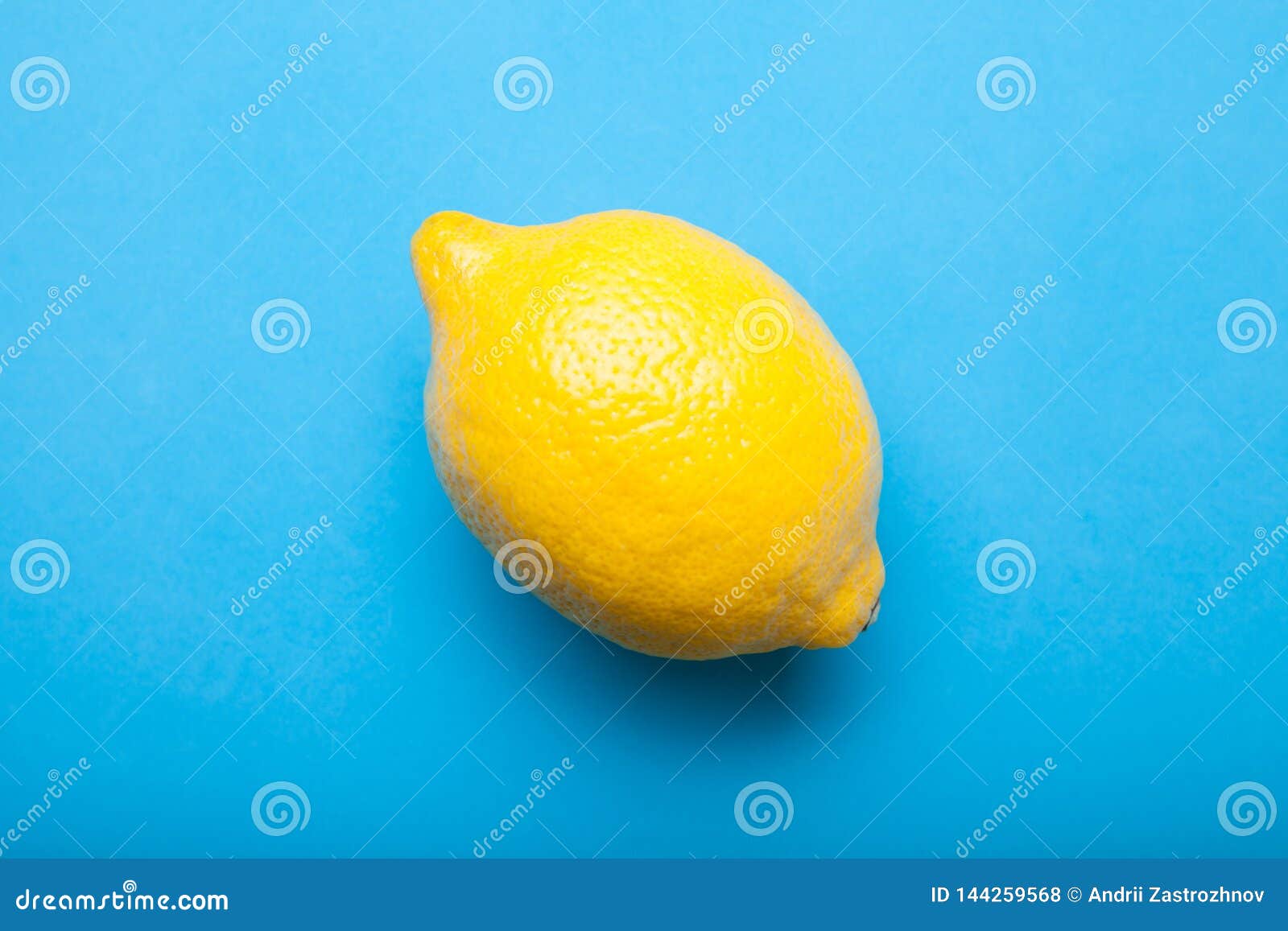Isolated Lemon on a Blue Background Stock Photo - Image of vitamin ...