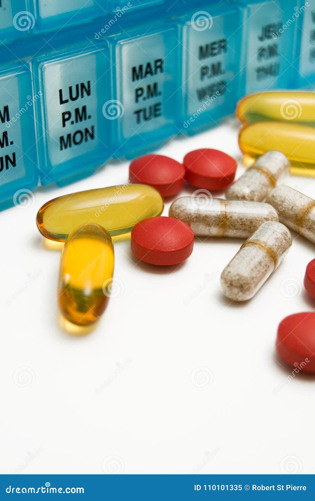 Isolated Multiple Vitamins and Medications with Weekly Container Stock ...