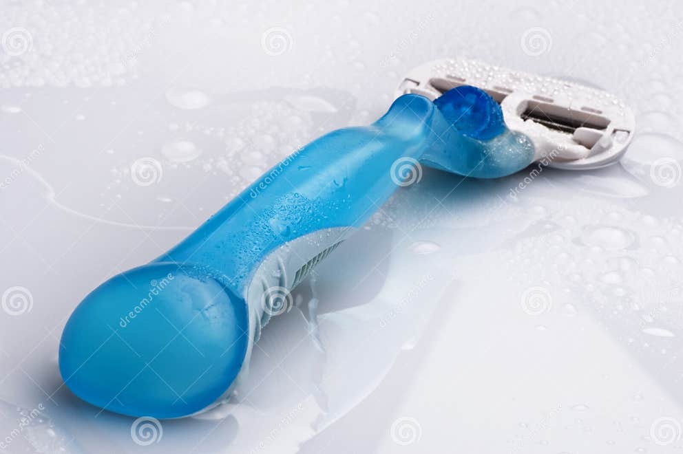 Isolated razor and water stock image. Image of removal - 1038651