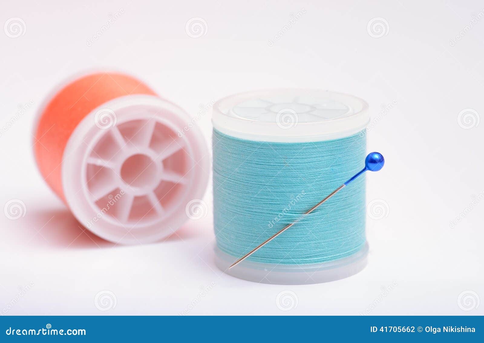 Isolated Thread Spools with Pin on White Background Stock Photo - Image ...