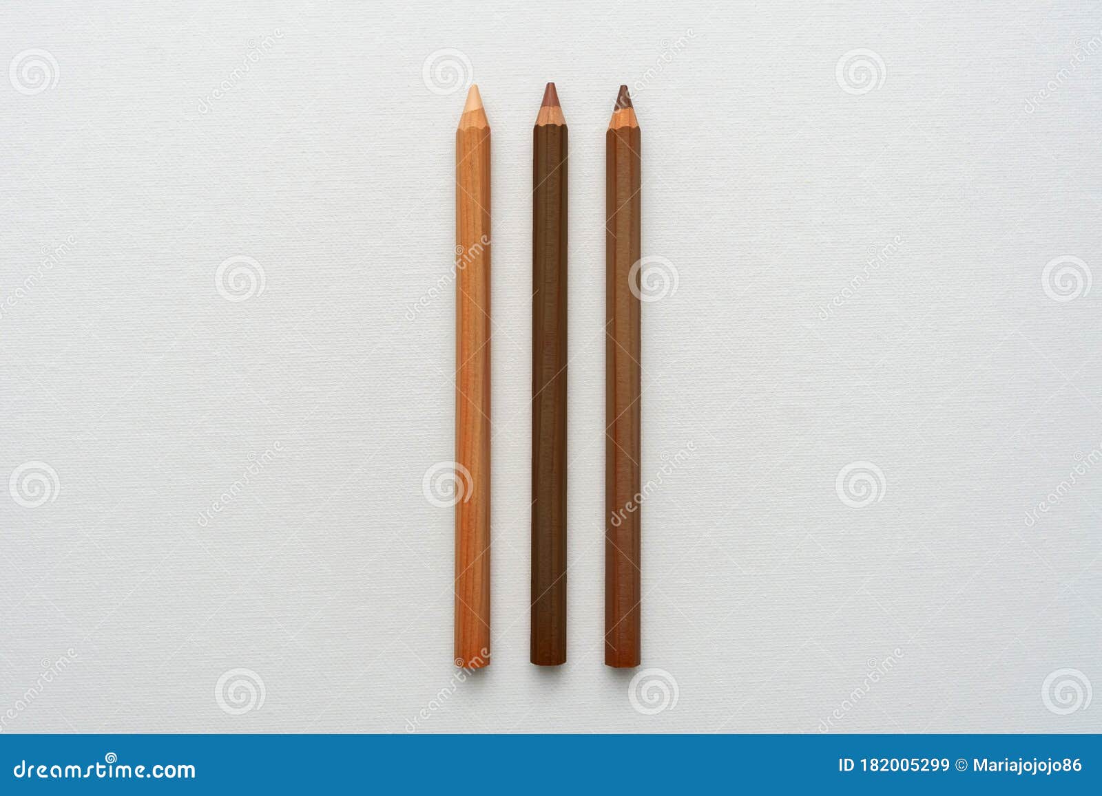 Three Neutral Color Pencils on a White Canvas Stock Image - Image of ...