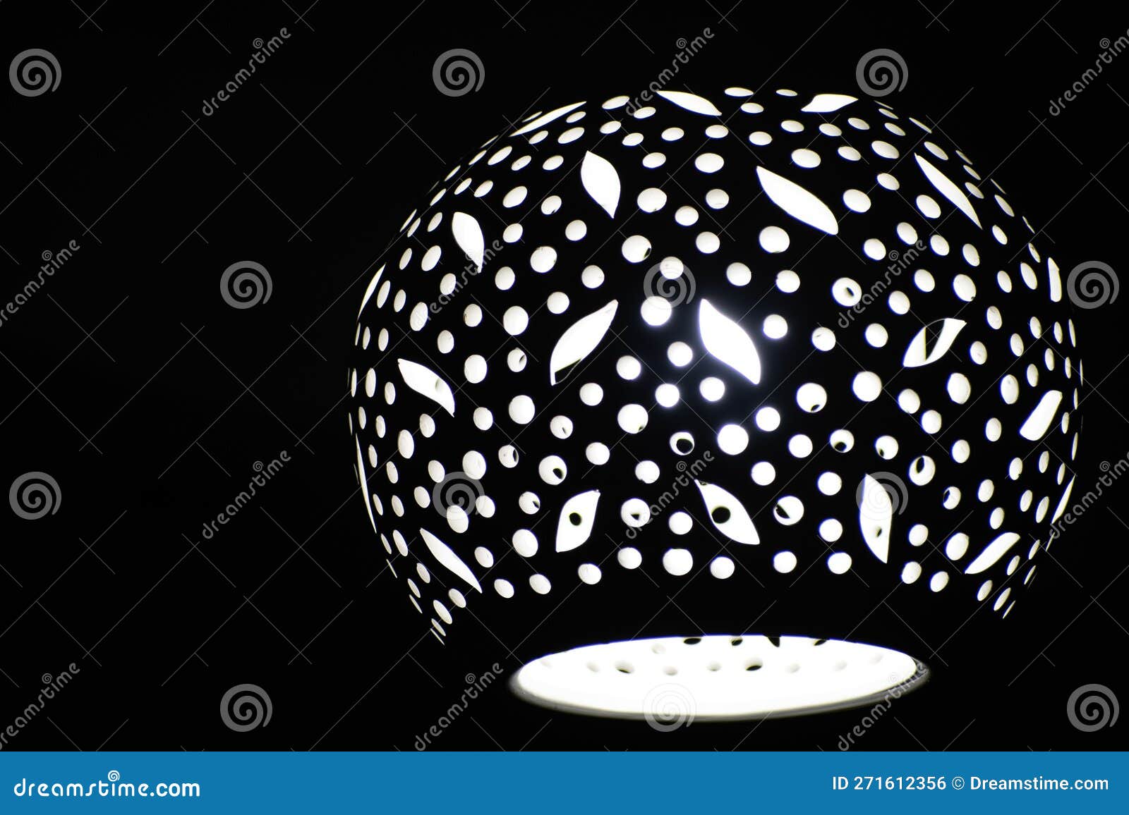 An Empty Lamp in the Darkness, with a Black Background Stock Photo ...