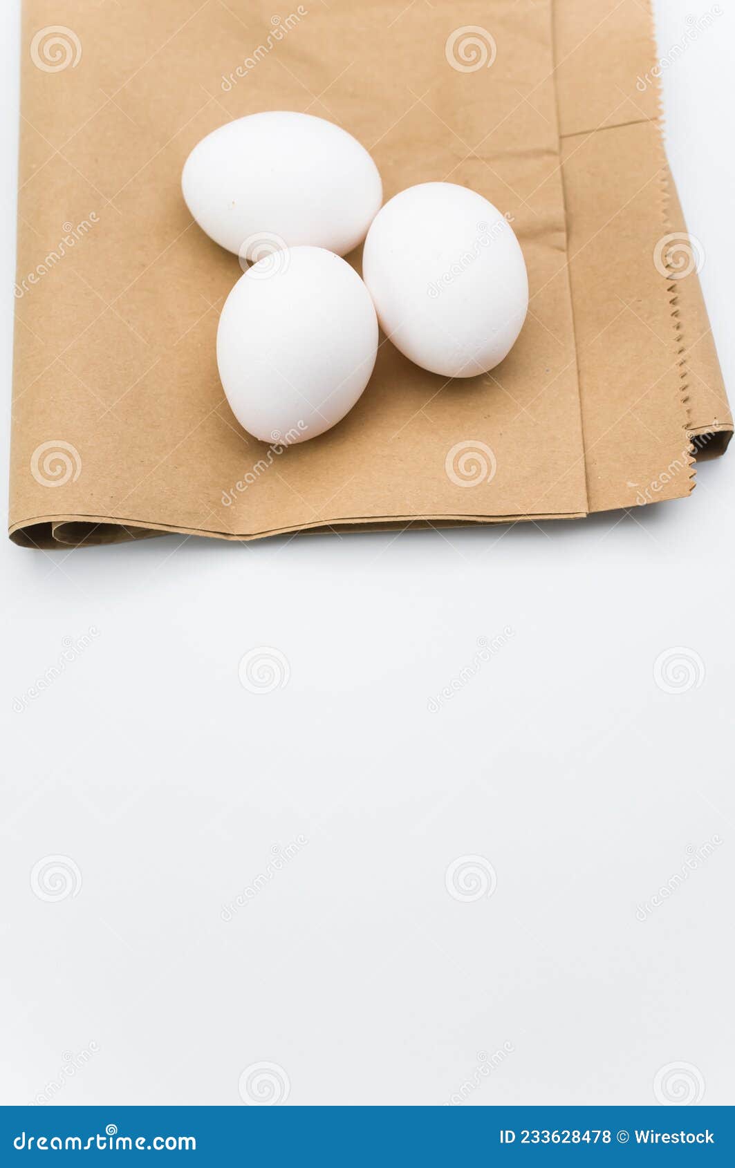 Isolated White Eggs on a White and Kraft Paper Background with Text ...
