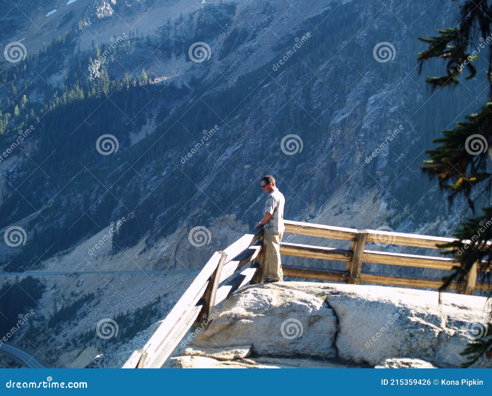 Isolation, Man Standing Alone Looking Over the Rocky Cliff Stock Photo ...
