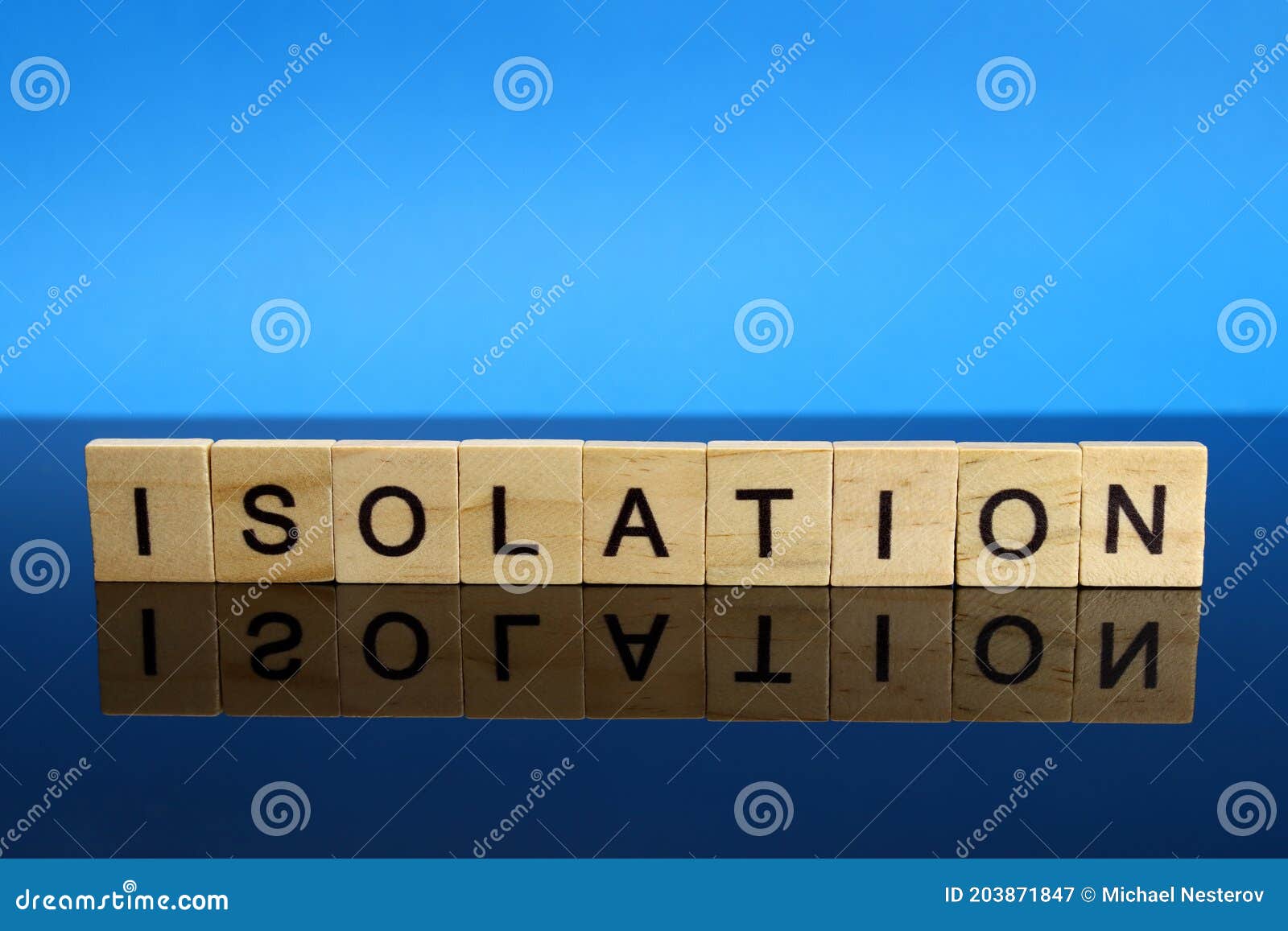 Isolation Word on Wooden Blocks on a Mirror Table Stock Image - Image ...