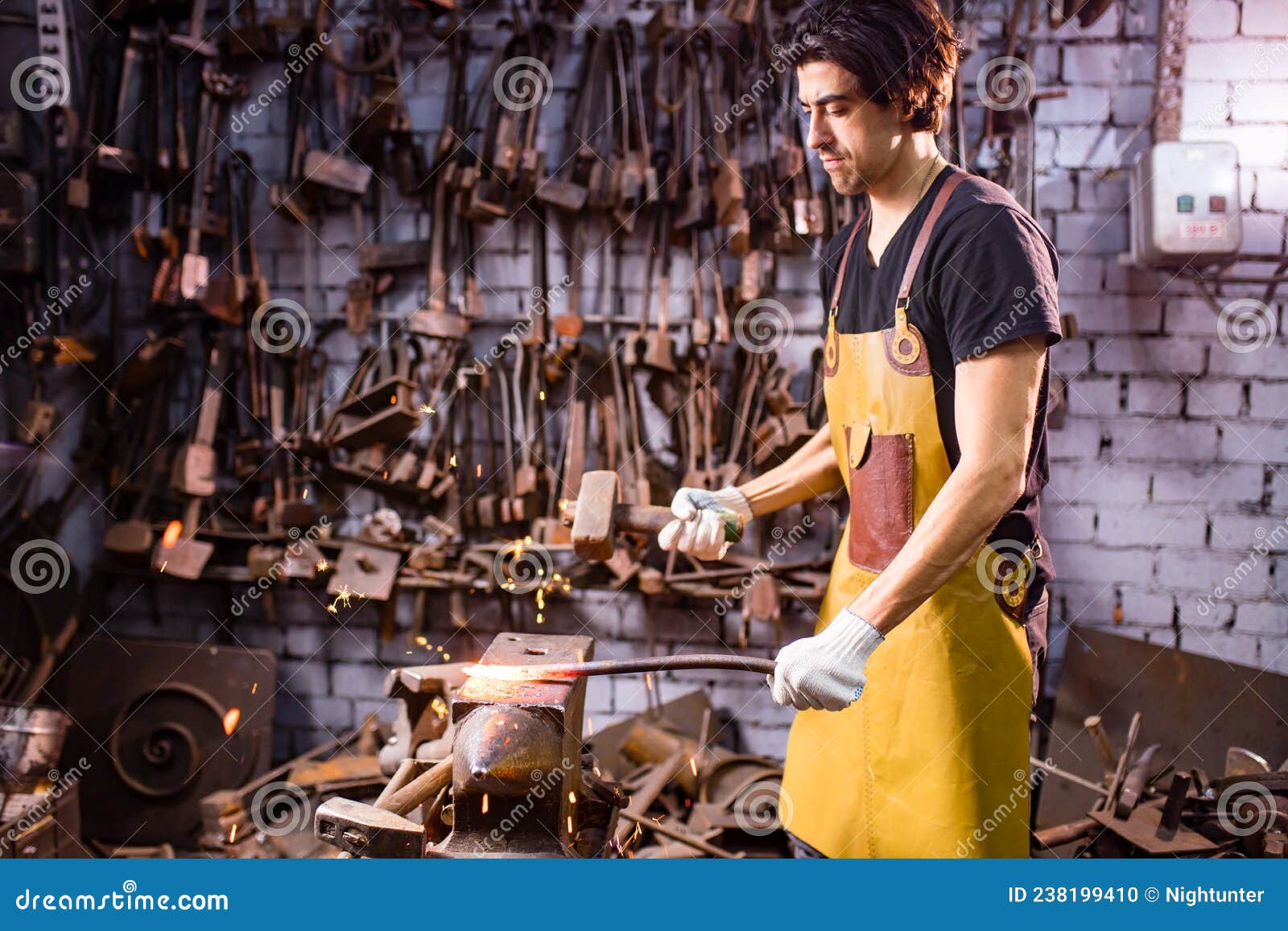 Italian Brunette Man Blacksmith Working in the Workshop Stock Photo ...