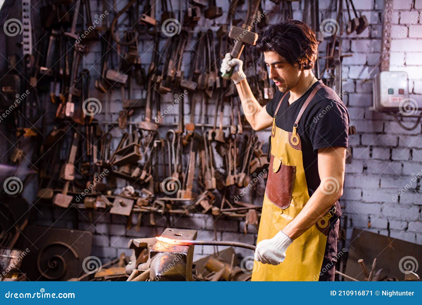 Italian Brunette Man Blacksmith Working in the Workshop Stock Image ...
