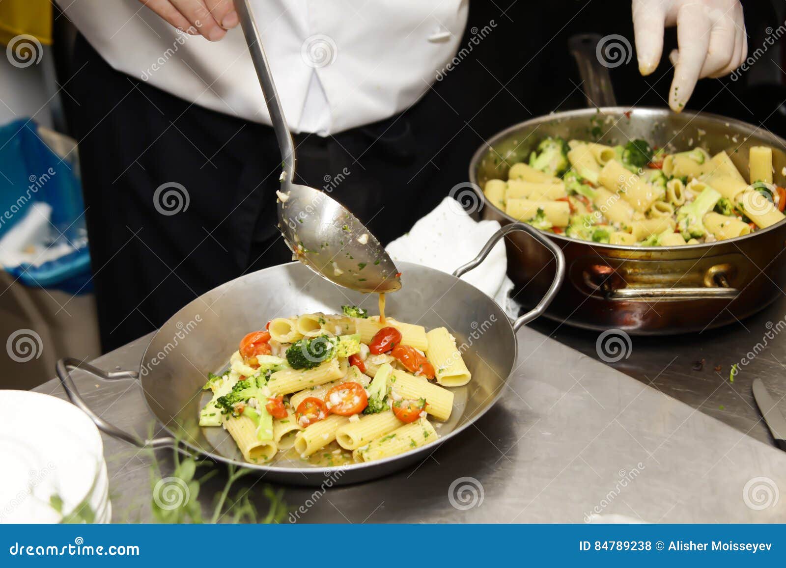 Italian Chef Prepares Pasta Stock Photo - Image of kitchen, green: 84789238