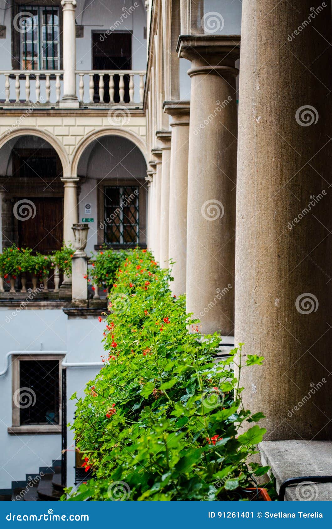 Italian Courtyard with Flowers on the Railing Stock Image - Image of ...