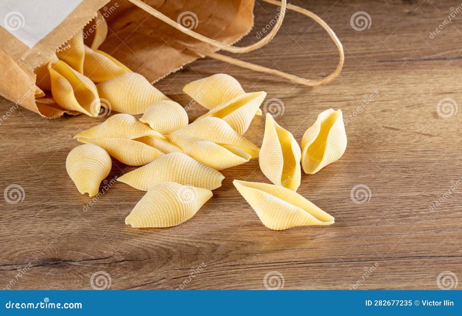 Italian Cuisine. Pasta in the Shape of a Shell is Poured Out of the ...