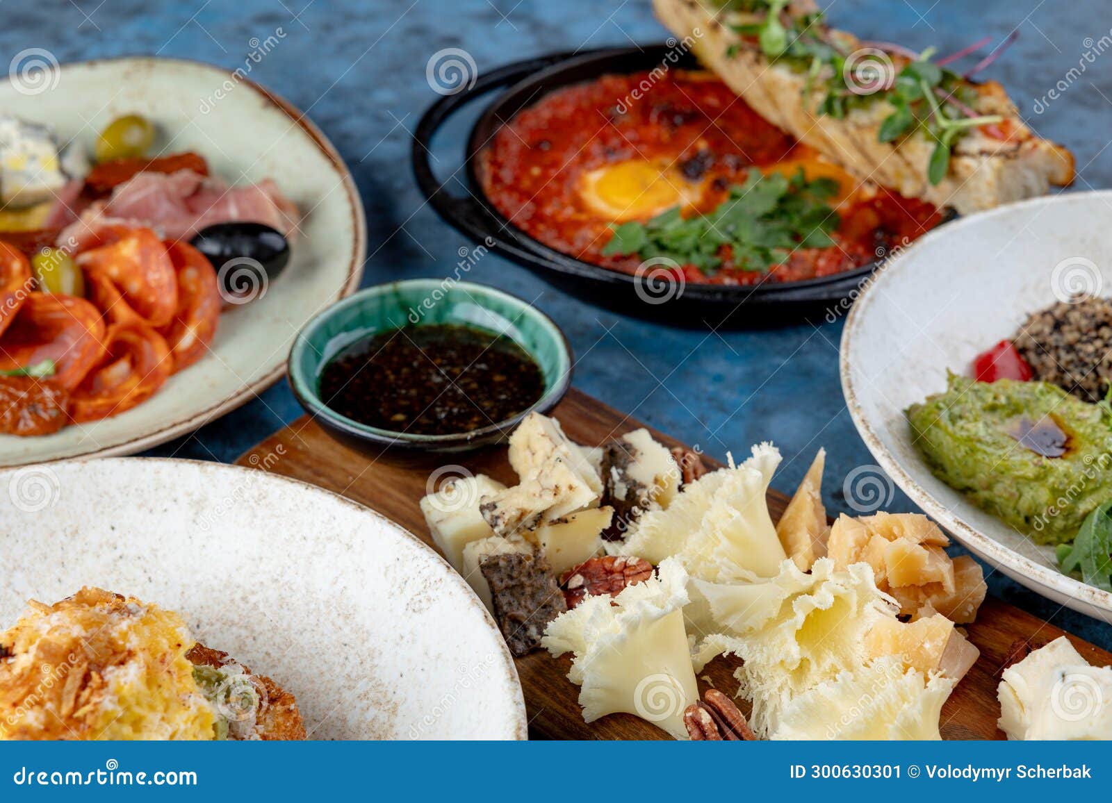 Table Served with Plates of Italian Dishes Stock Image - Image of plate ...