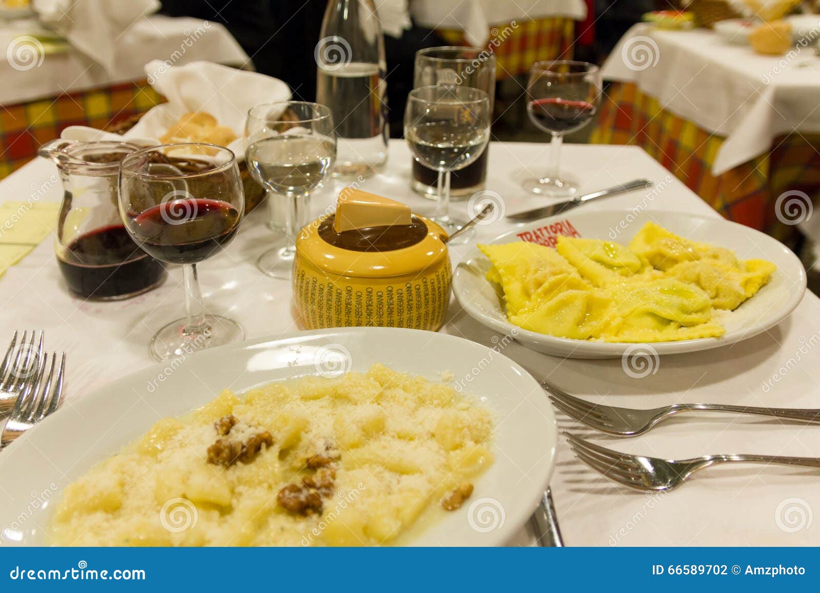 An Italian Dinner stock photo. Image of dishes, cloth - 66589702