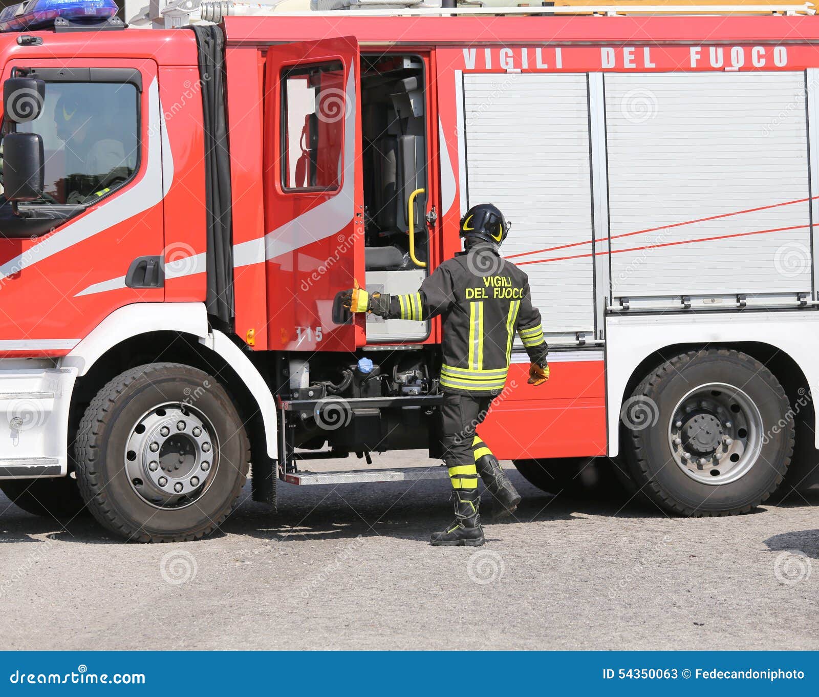 Italian Firefighters during an Emergency with Protective Suits a Stock ...