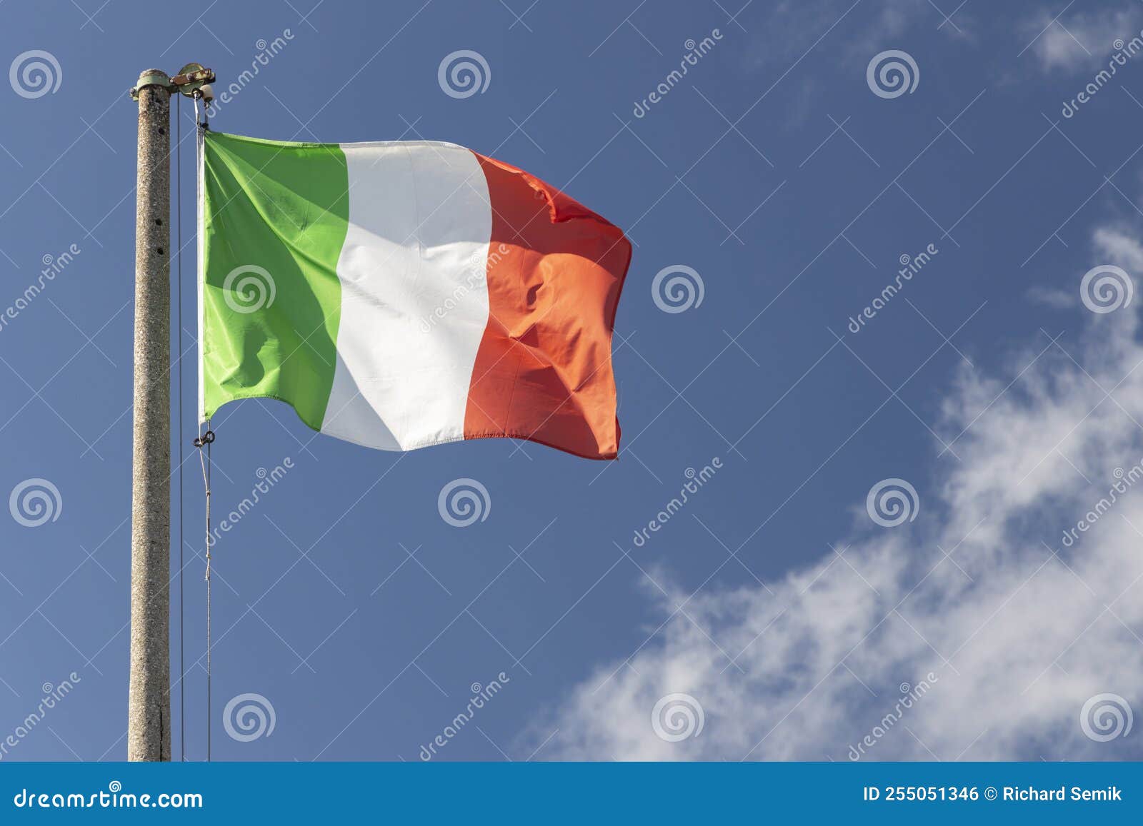 Italian Flag Blowing in the Wind in the Blue Sky Stock Photo - Image of ...