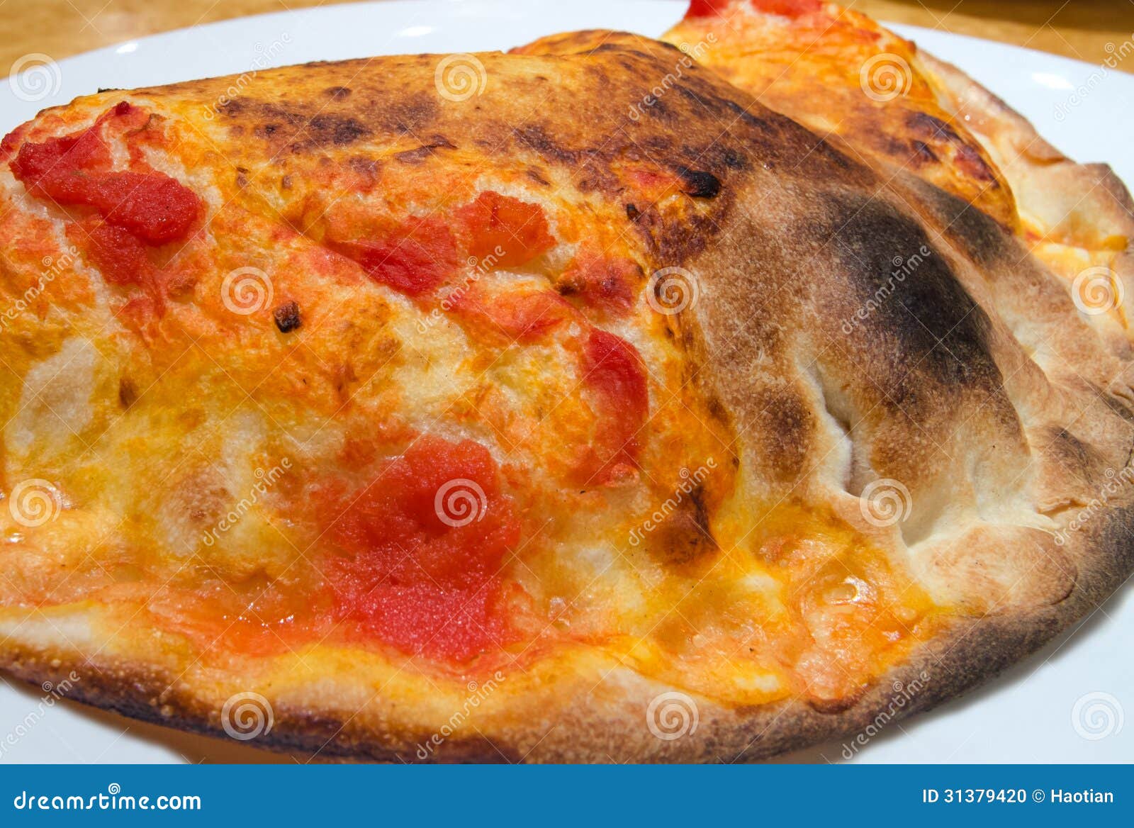 Italian Folded Pizza stock photo. Image of cuisine, tomato - 31379420