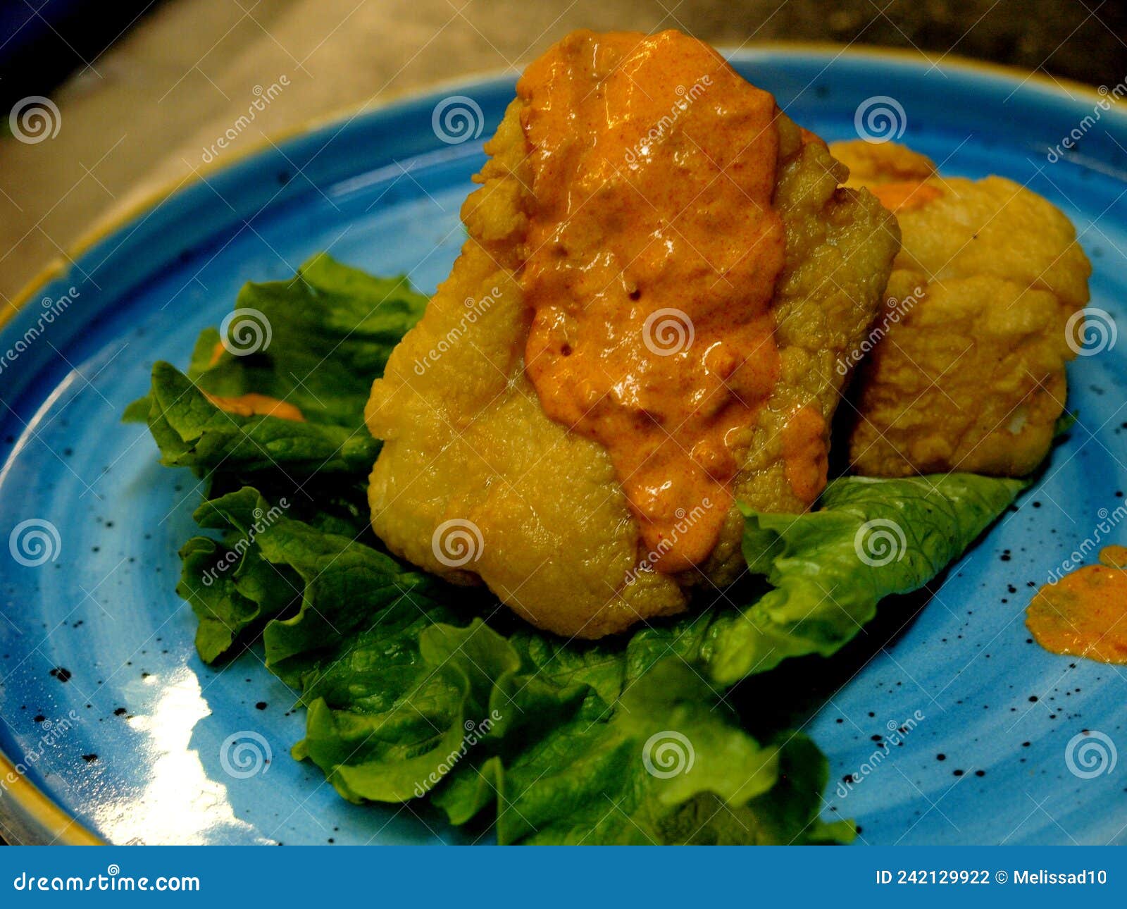 Italian Food - Fried Cod with Salad in a Blue Dish Stock Photo - Image ...