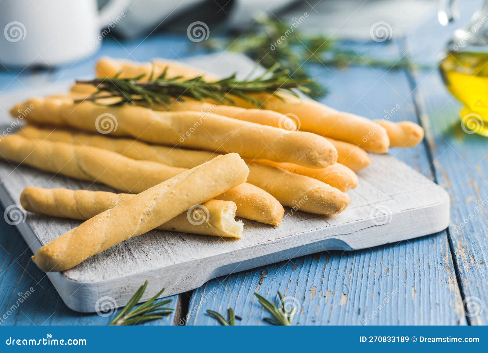 Italian Grissini Bread Sticks on Blue Table Stock Image - Image of ...