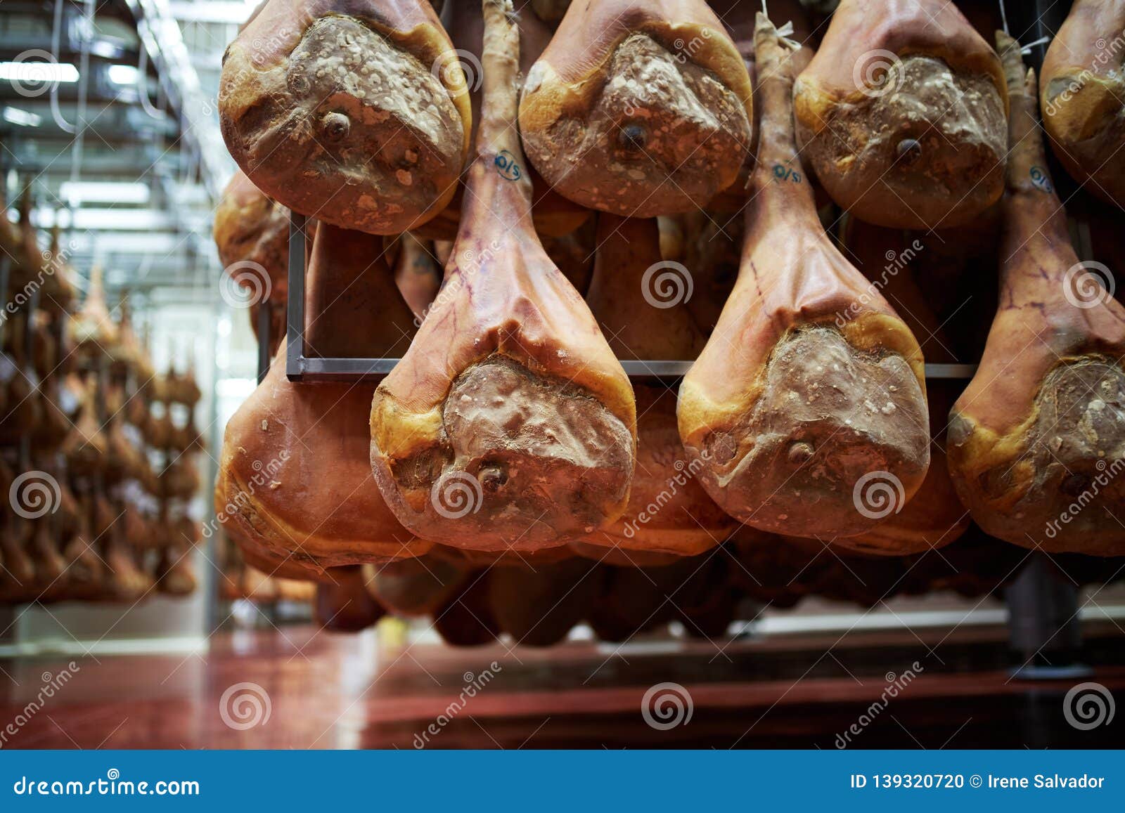 Italian Hams San Daniele on the Rack Stock Photo - Image of close, wall ...