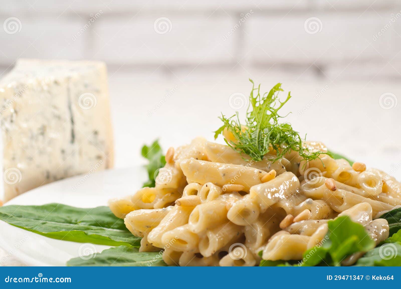Italian Pasta Penne Gorgonzola and Pine Nuts Stock Image - Image of ...