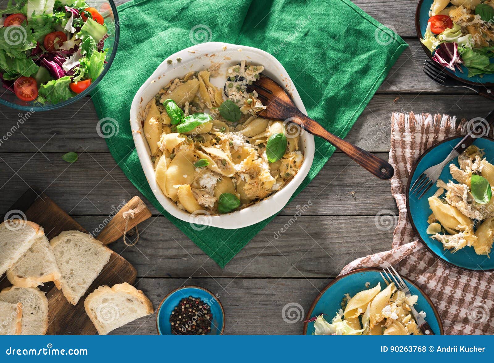 Italian Pasta with Salad on Wooden Table. Dinner Table Concept Stock ...