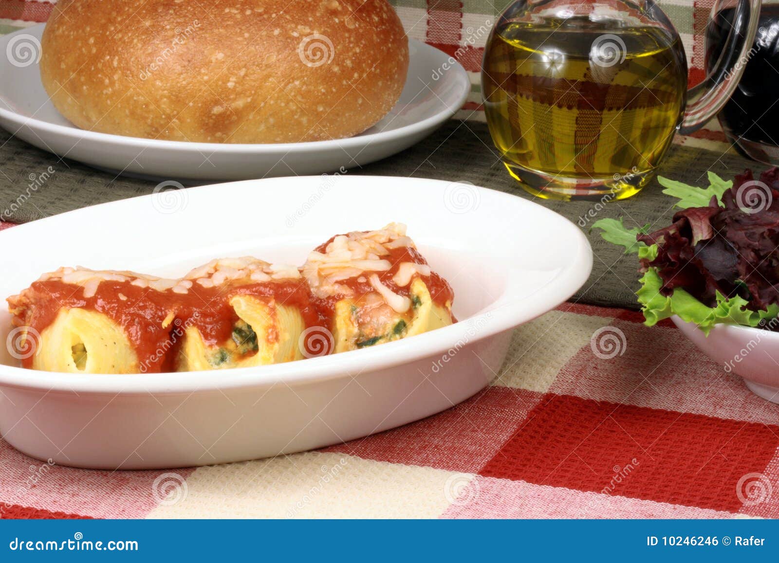 Italian pasta shell rolls stock photo. Image of sauce - 10246246
