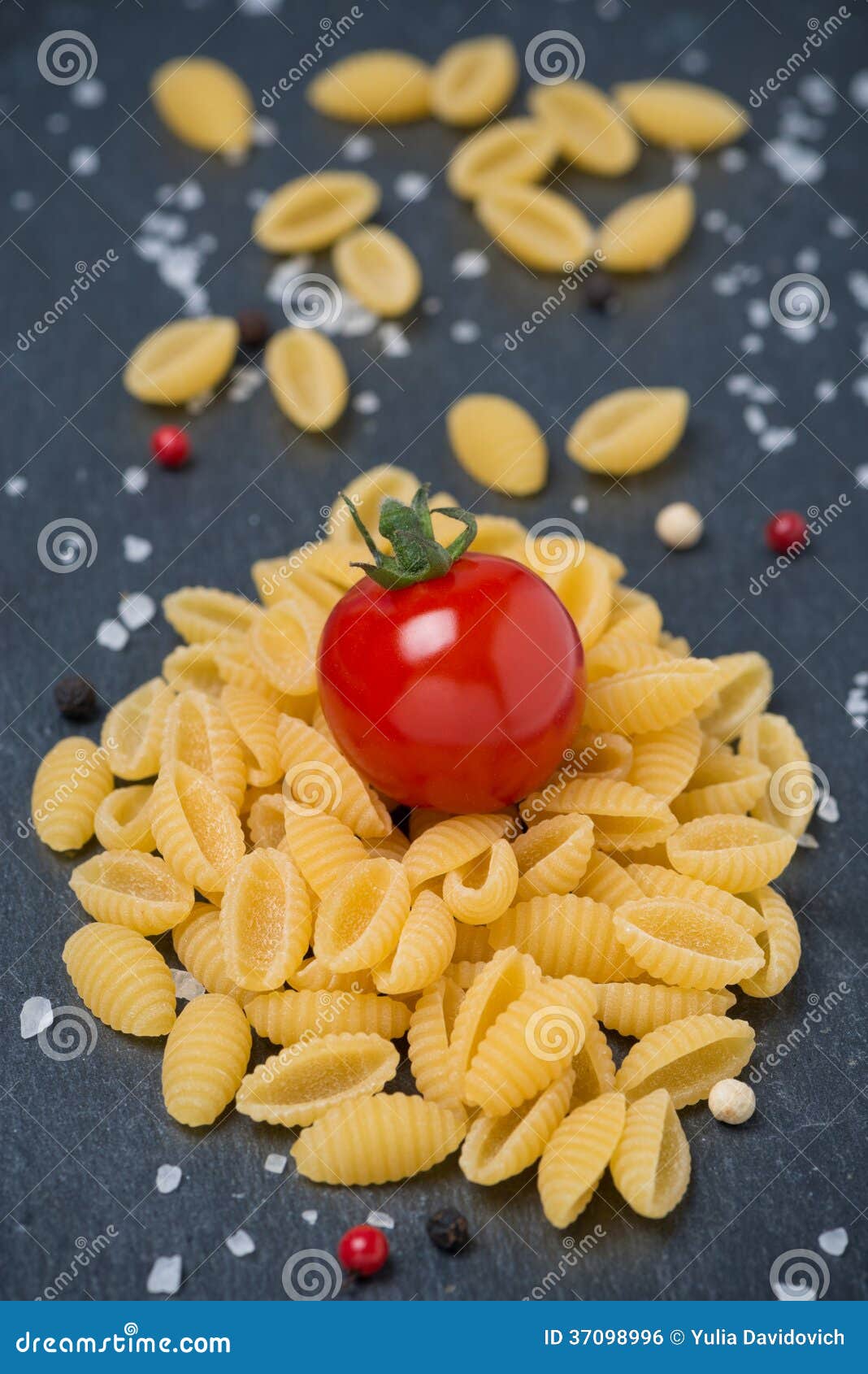Italian Pasta Shells, Cherry Tomatoes, Salt and Pepper Stock Photo ...