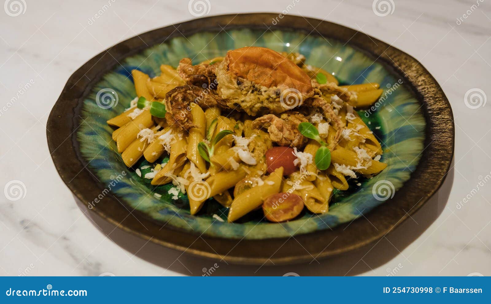 Italian Penne Pasta with Fish and Crab on Top Stock Photo - Image of ...