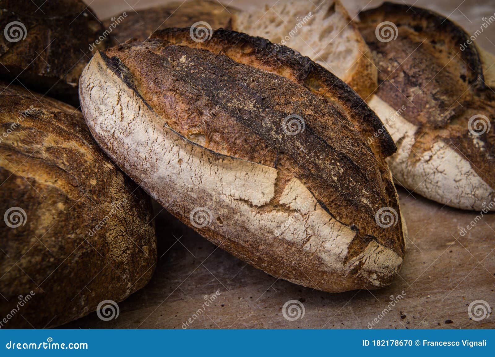 Still Life of Various Delicious Homemade Breads on a Wooden Surface ...