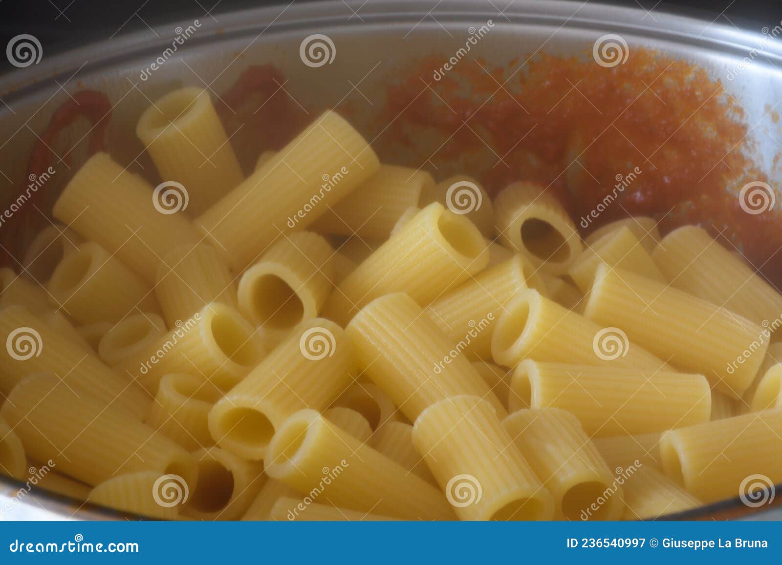 Italian Rigatoni Pasta while Cooking Stock Image - Image of tomato ...